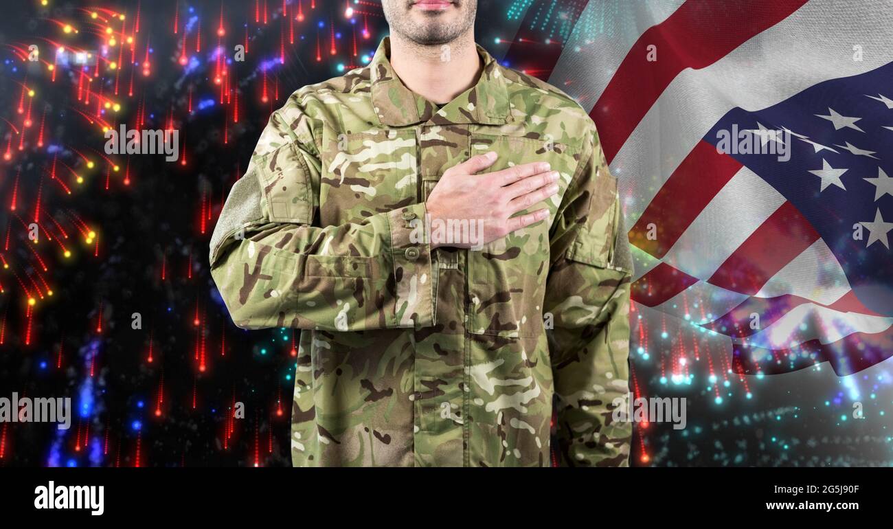 Composition of male soldier with hand on heart, over american flag and ...
