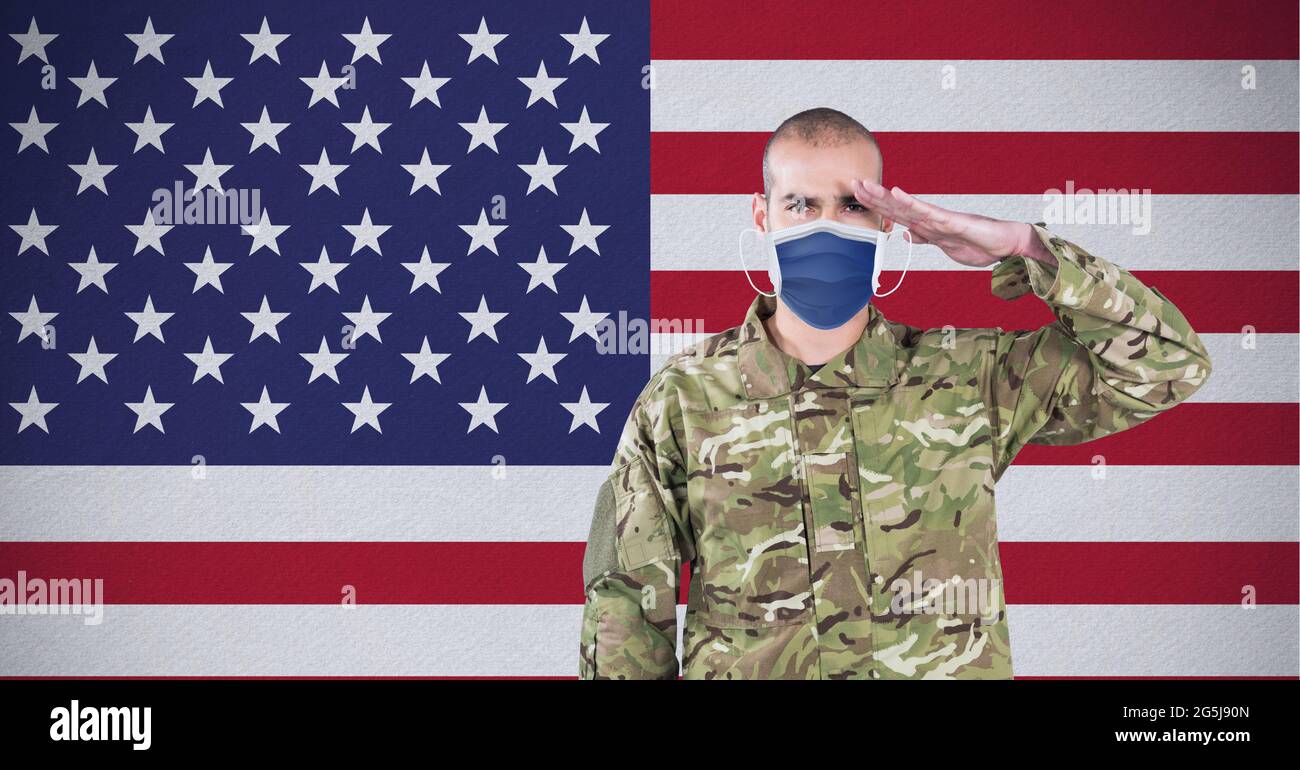 Composition of saluting male soldier wearing face mask, against ...