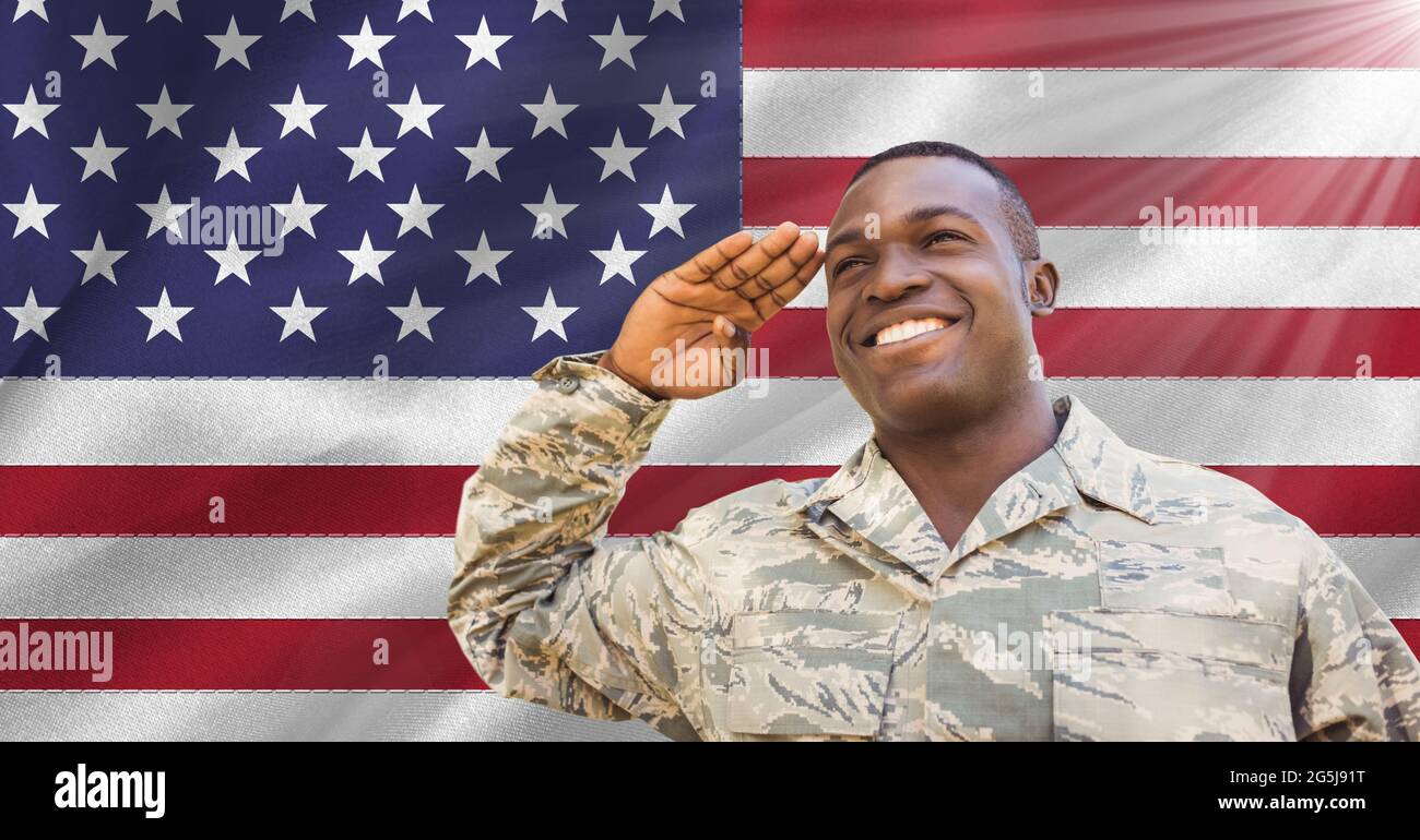 Composition of smiling male soldier saluting, against american flag ...