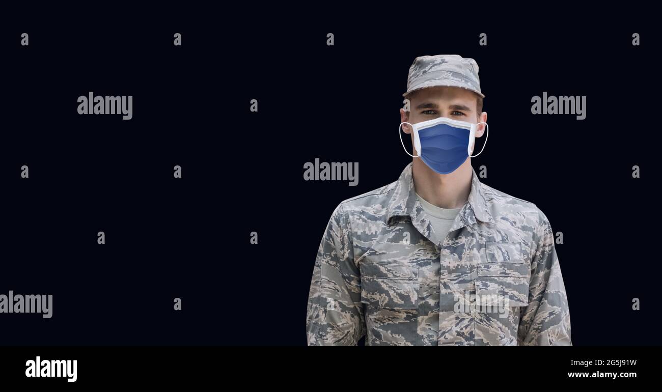 Composition of male soldier wearing face mask, against black background ...