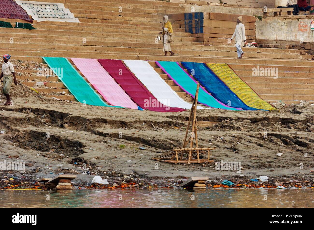 Washing and drying at the Ghats of Varanasi along the banks of the ...