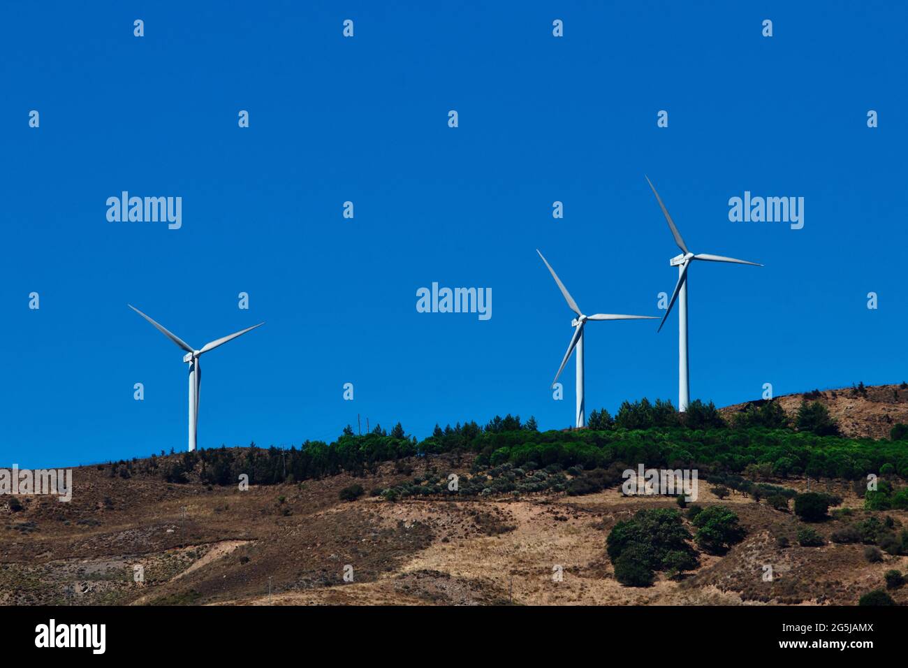 Wind Turbines On The Greek Island Of Crete Generate Electricity Stock ...