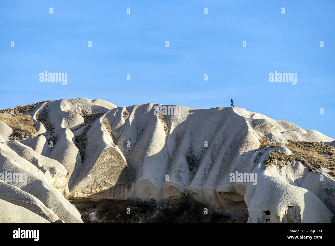 Tourists discover the beautiful Fairy Chimney formations in Cappadocia ...