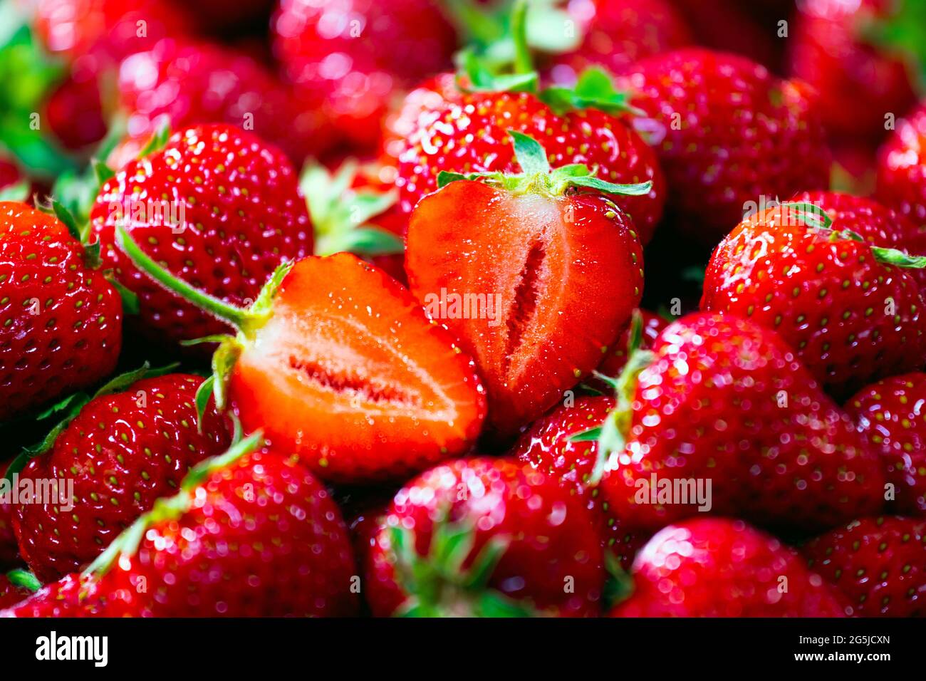 Fresh and Juicy Strawberry raw background, a lot of red berries, Close ...