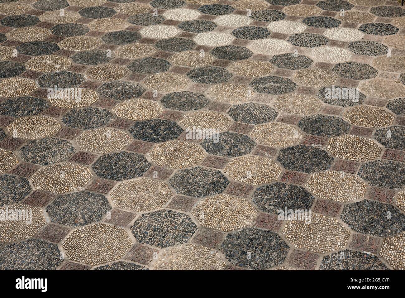 Geometric pebble paving design Stock Photo - Alamy