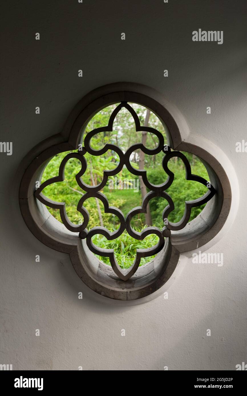 View through Chinese oriental window Stock Photo - Alamy
