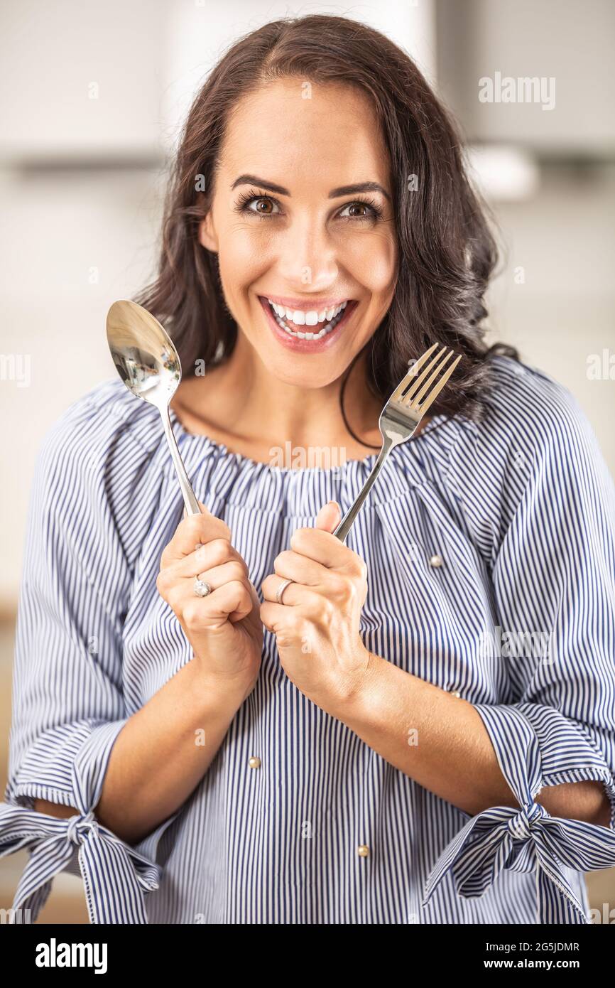 Hand holds fork hi-res stock photography and images - Alamy