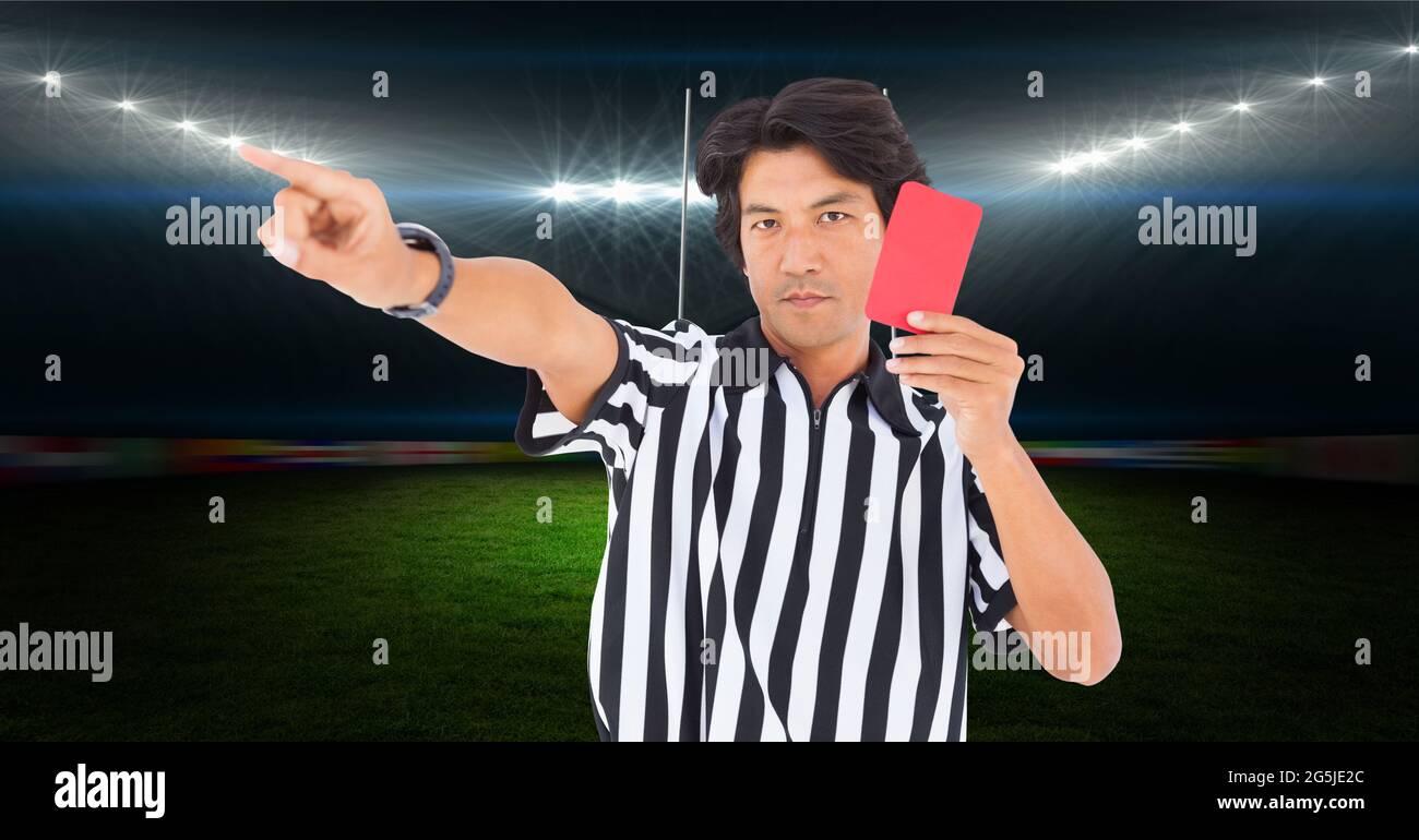 Composition of male referee holding red card at football stadium Stock ...