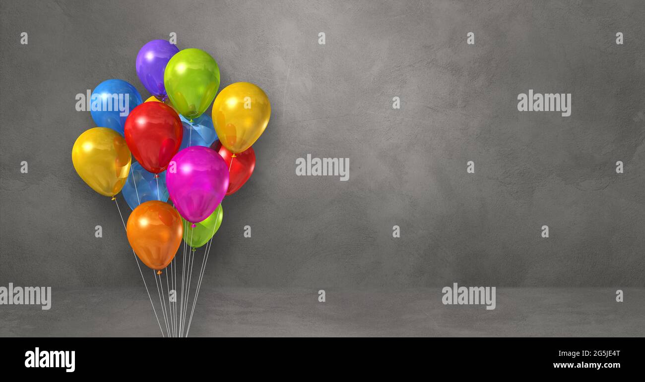 Colorful balloons bunch on a grey wall background. Horizontal banner ...
