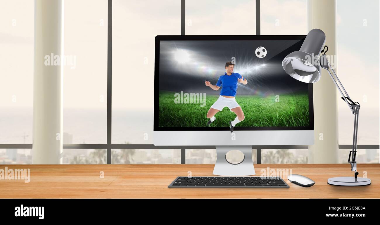 Composition of male football player with ball at football stadium in ...