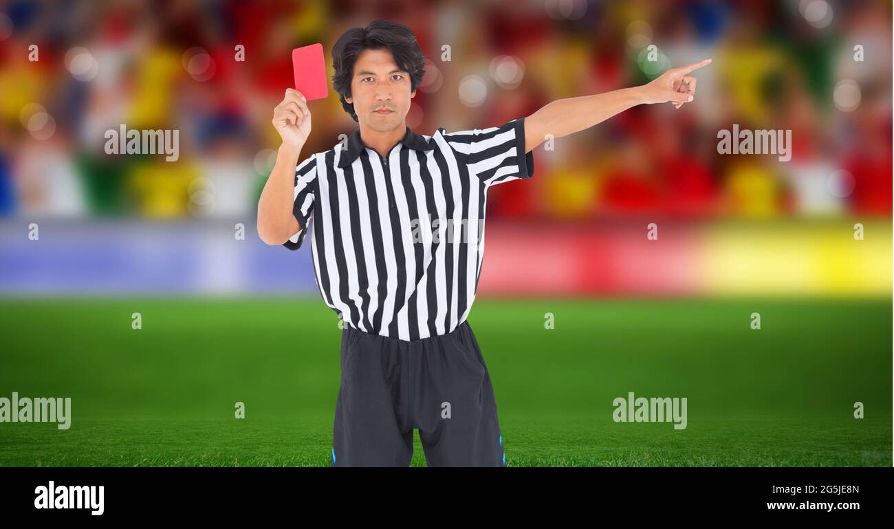 Composition of male referee holding red card at football stadium Stock ...