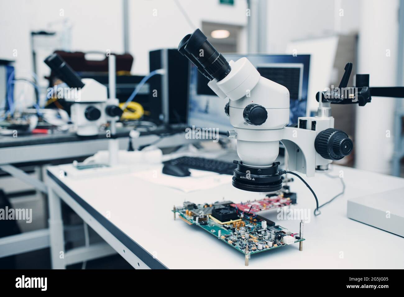 Microscope in Scientific research tech Laboratory on table Stock Photo ...
