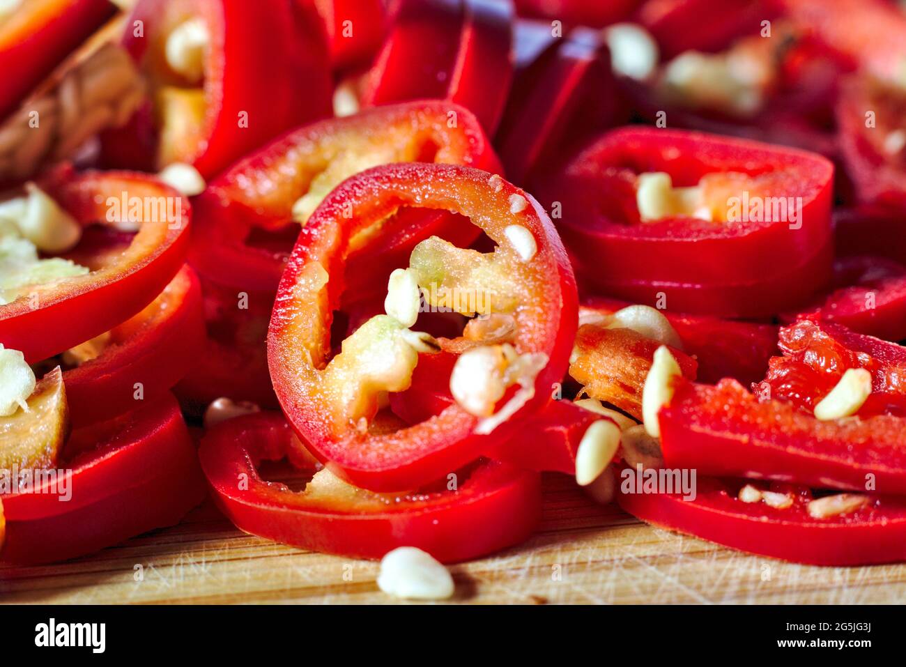 sliced heap of red chili Stock Photo - Alamy