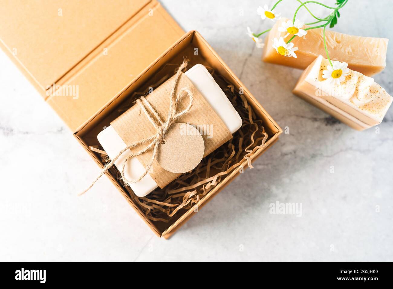 Natural soap in gift box with empty mockup tag Stock Photo - Alamy