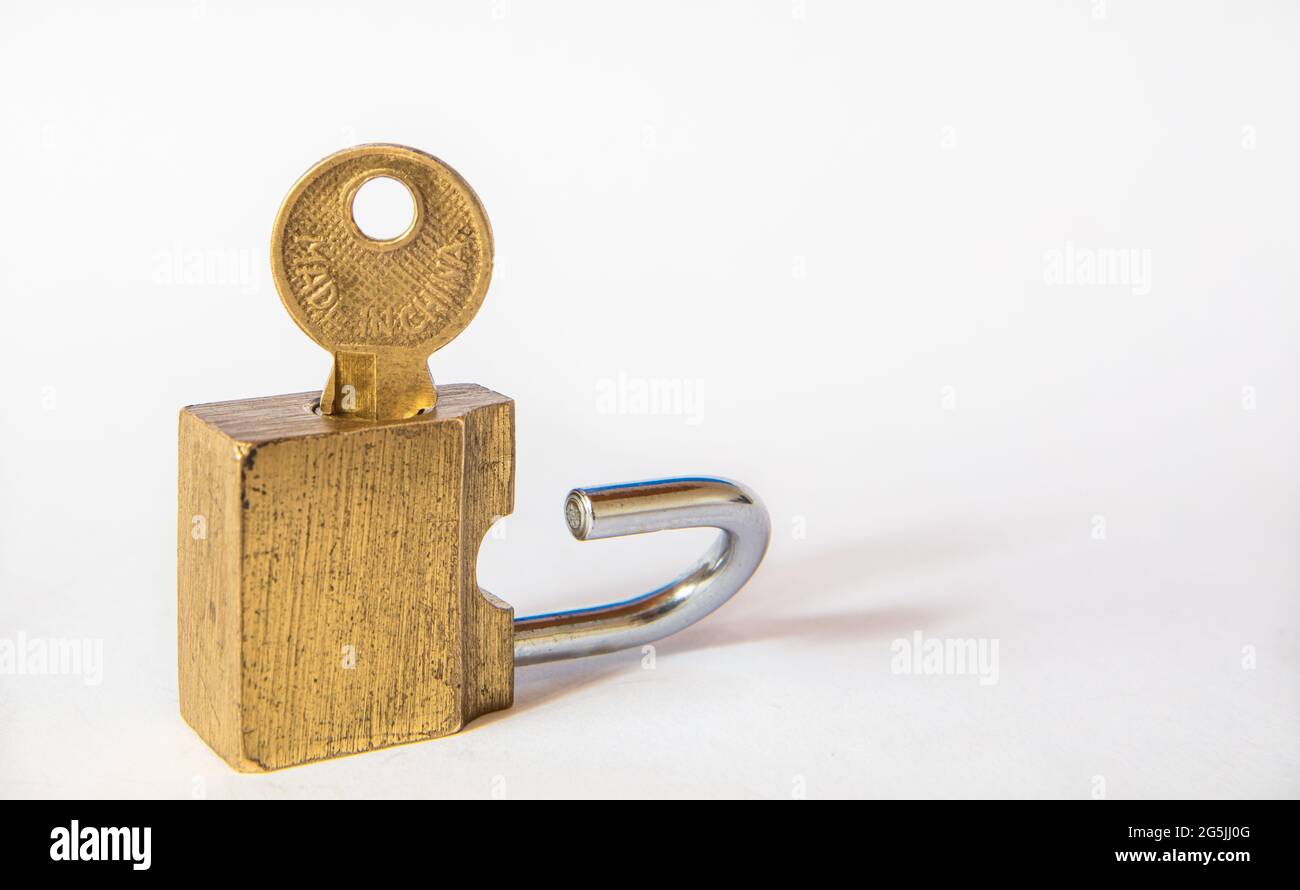 Open padlock on a white background Stock Photo - Alamy