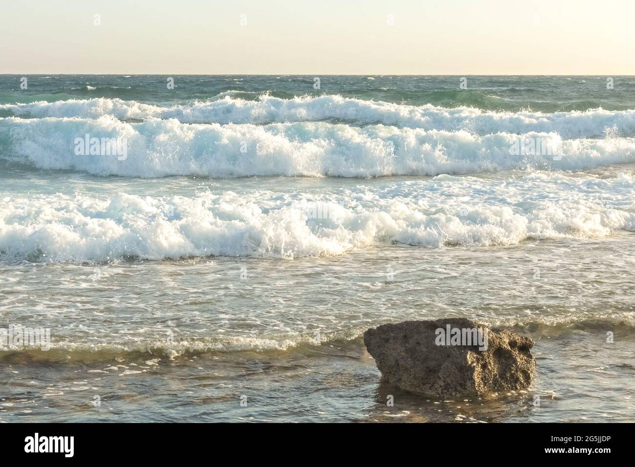 The coast of the Mediterranean Sea. The waves. The horizon. Sky and sea ...
