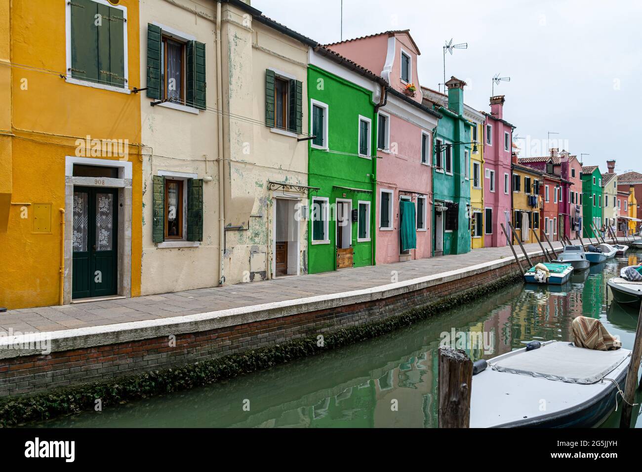 Colorful houses in Burano, a small island in the Lagoon of Venecia ...