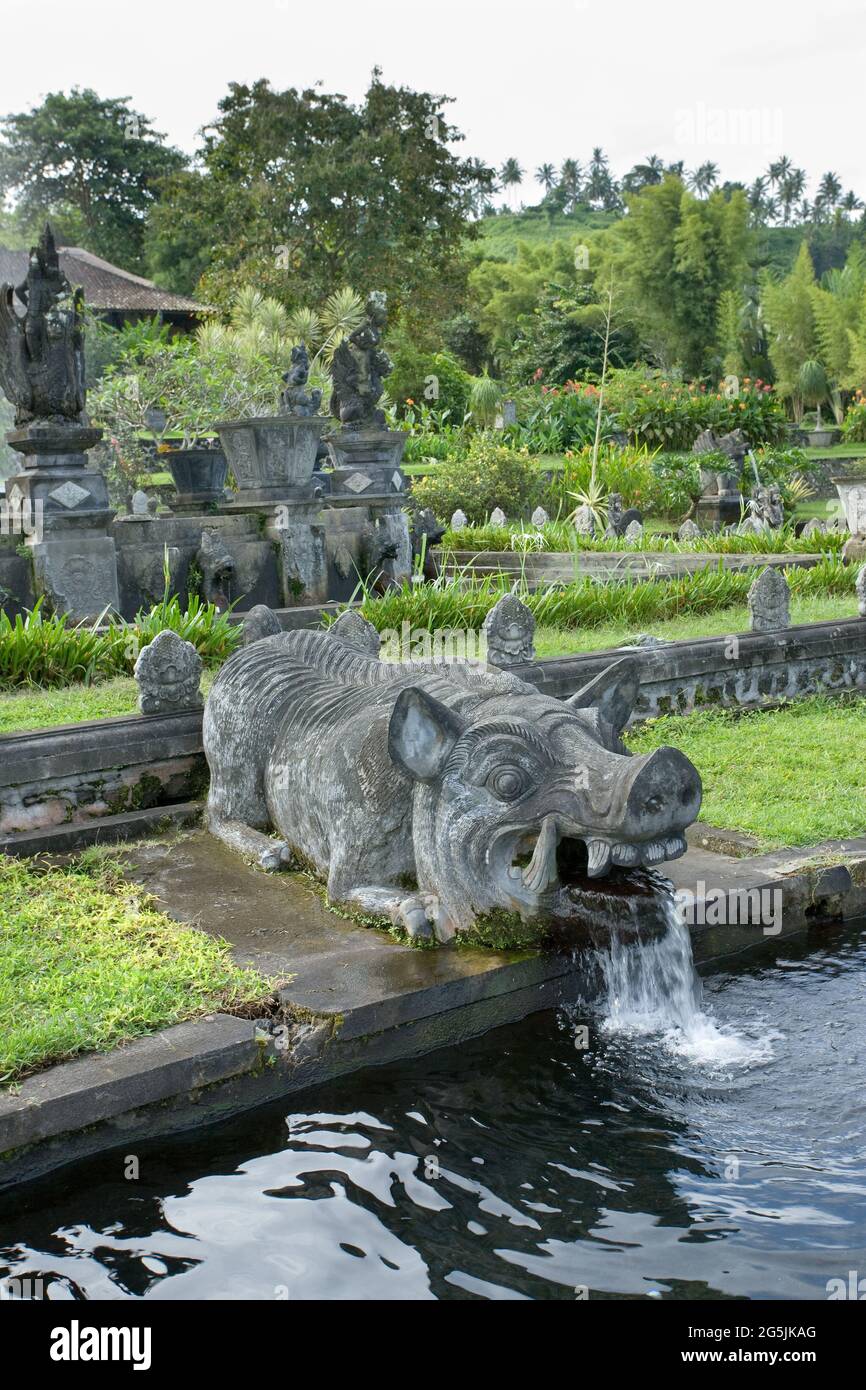 Wild boar fountain, Tirta Gangga (Water of the Ganges) holy temple ...