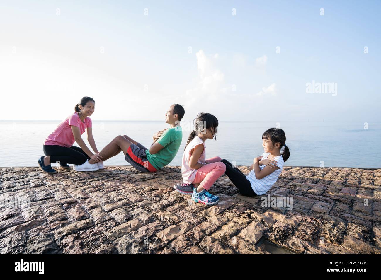Child situp exercise hi-res stock photography and images - Alamy
