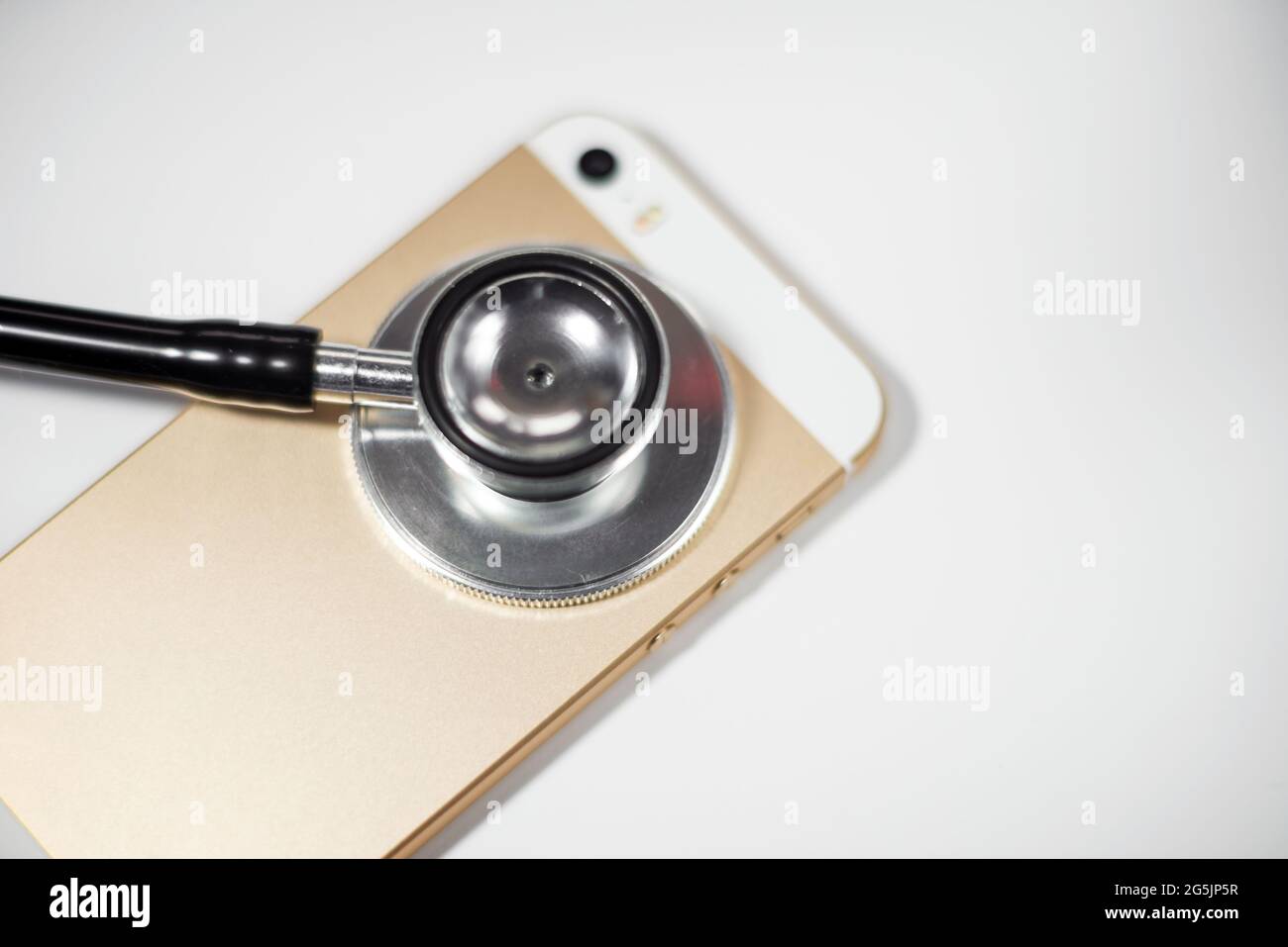 Stethoscope with smart phone. on white, abstract background to solution ...