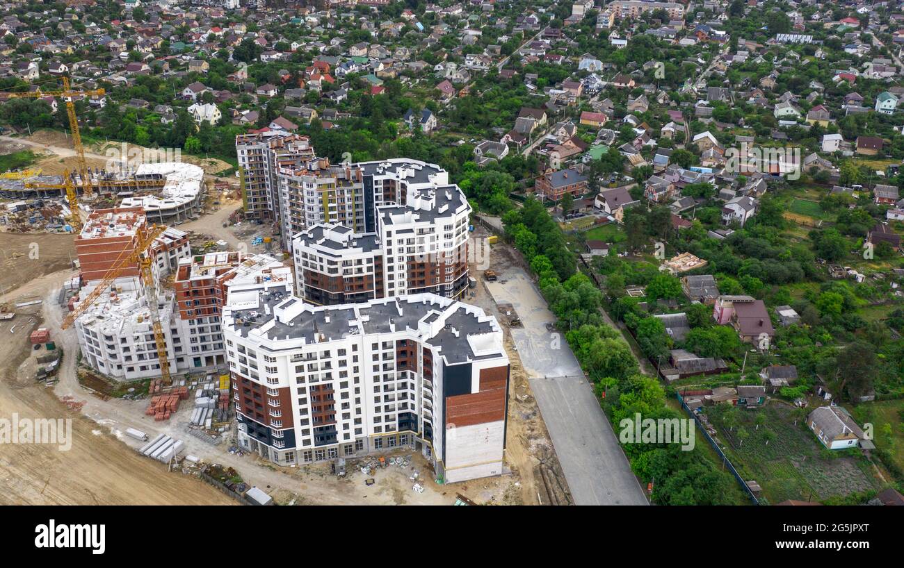 View from the drone on the high-rise buildings being built next to the ...