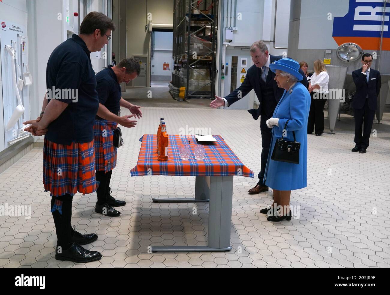 Queen Elizabeth II during a visit to AG Barr's factory in Cumbernauld ...