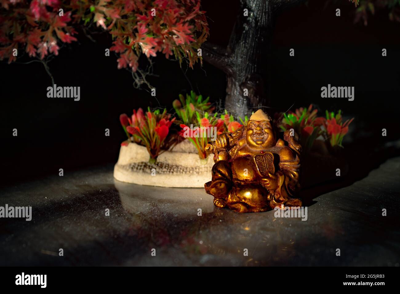Laughing Buddha Statue on under the Tree. Statue of Laughing Buddha ...