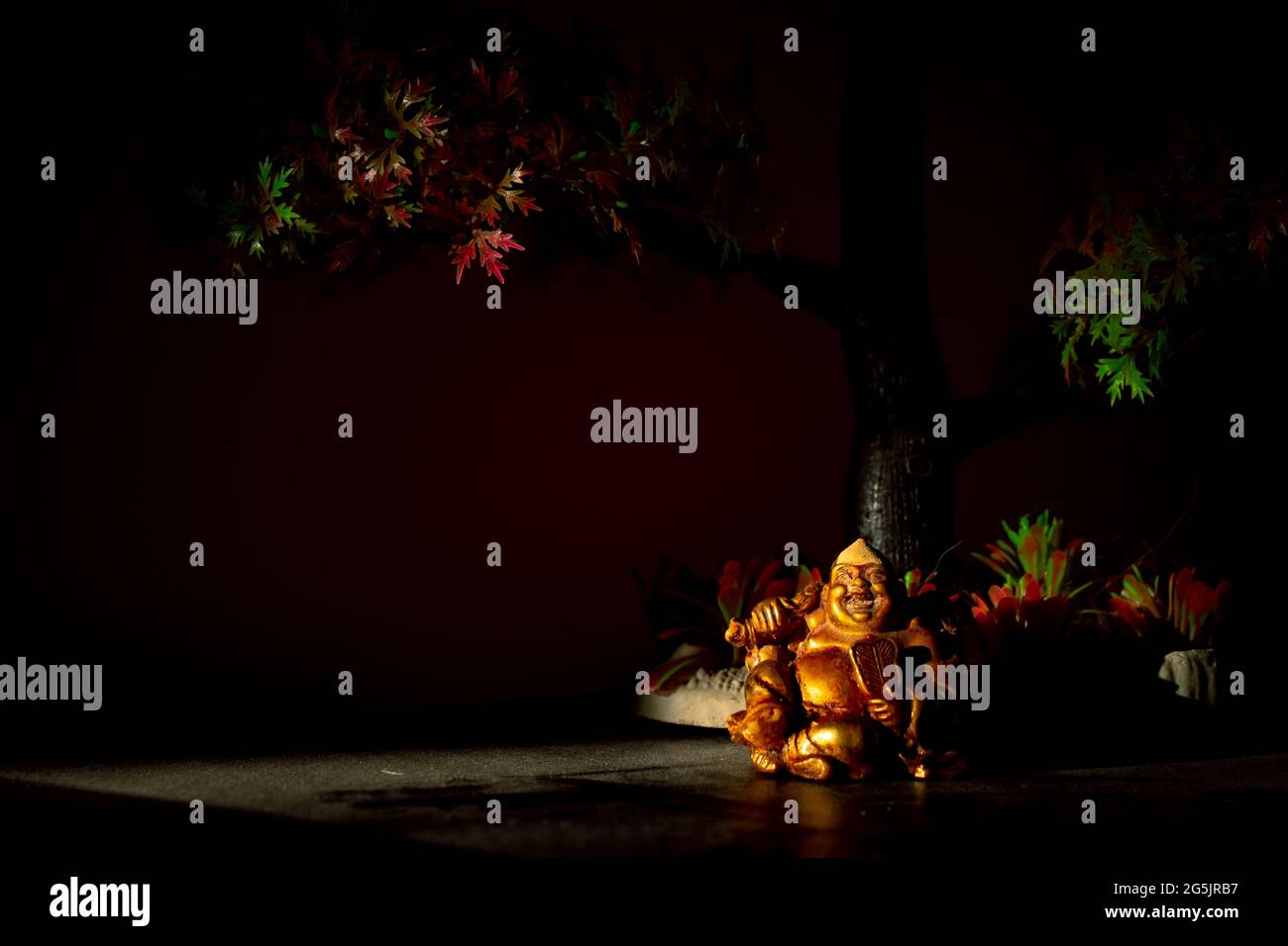 Laughing Buddha Statue on under the Tree. Statue of Laughing Buddha ...