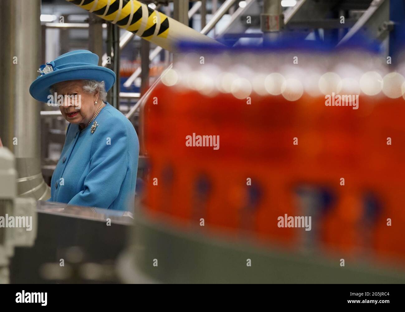 Queen Elizabeth II during a visit to AG Barr's factory in Cumbernauld ...