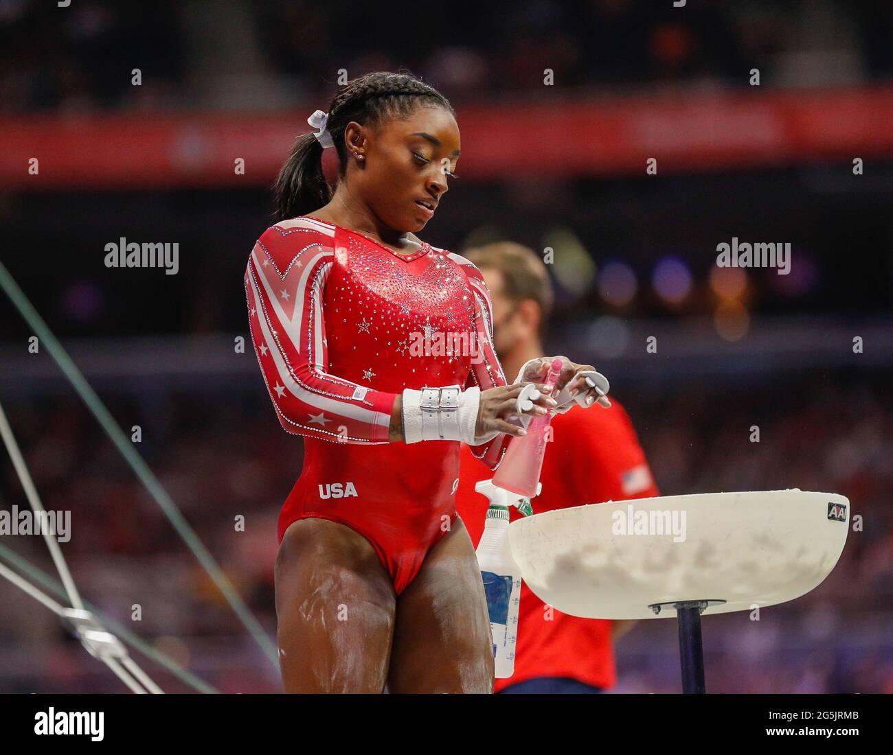 June 27, 2021: Simone Biles prepares for her bar routine during Day 2 ...