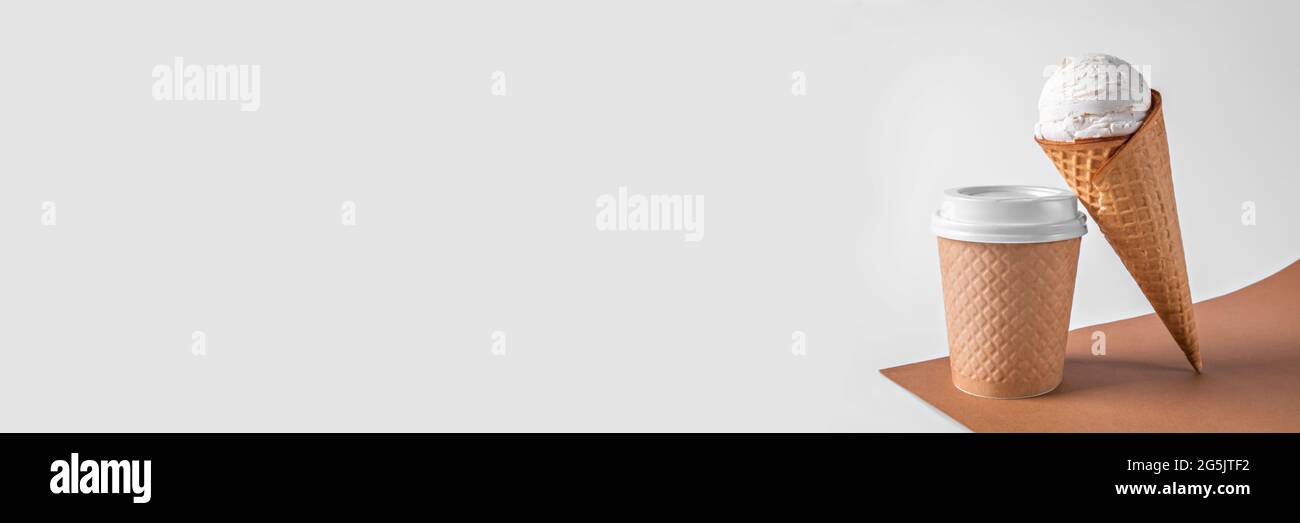 Beige disposable paper cup for coffee or tea and ice cream in a waffle ...