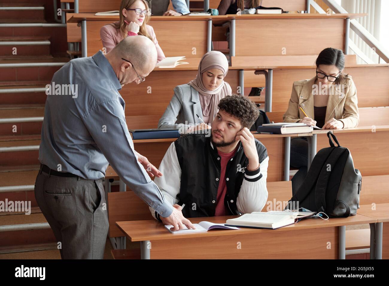 Professor student talking. hi-res stock photography and images - Alamy