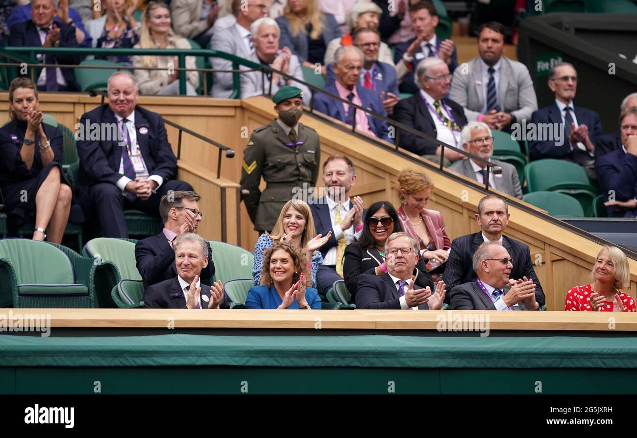 Hannah Ingram-Moore, daughter of Sir Tom Moore (left centre) in the ...