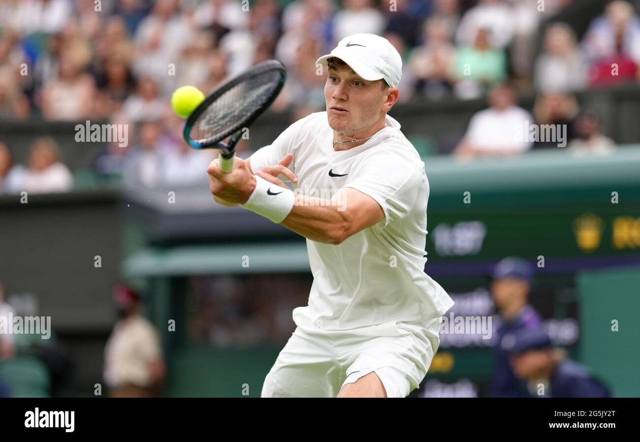 Jack Draper in action against Novak Djokovic on centre court on day one ...