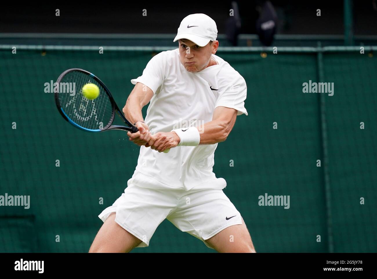 Jack Draper in action against Novak Djokovic on centre court on day one ...