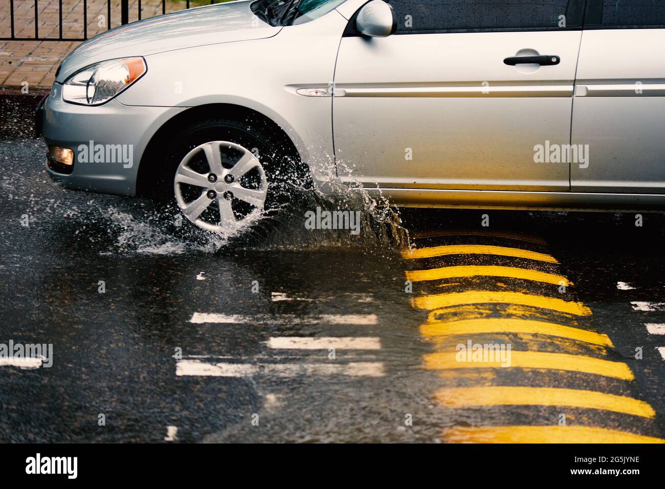 Driving a car around the city during a pouring rain Stock Photo - Alamy