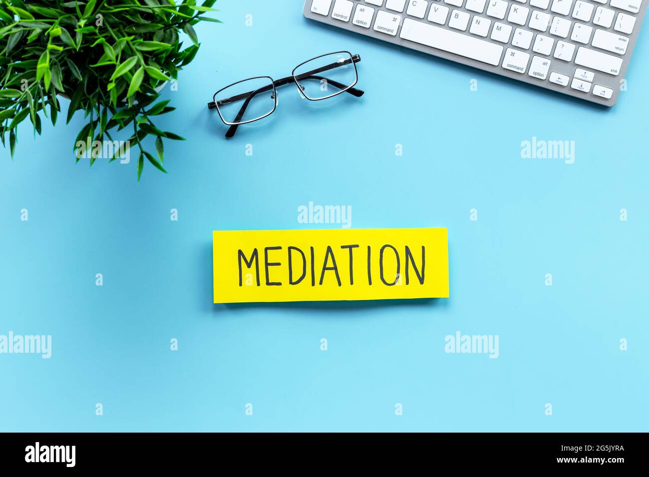 Word mediation on sticky notes on office table. Conflict resolving ...