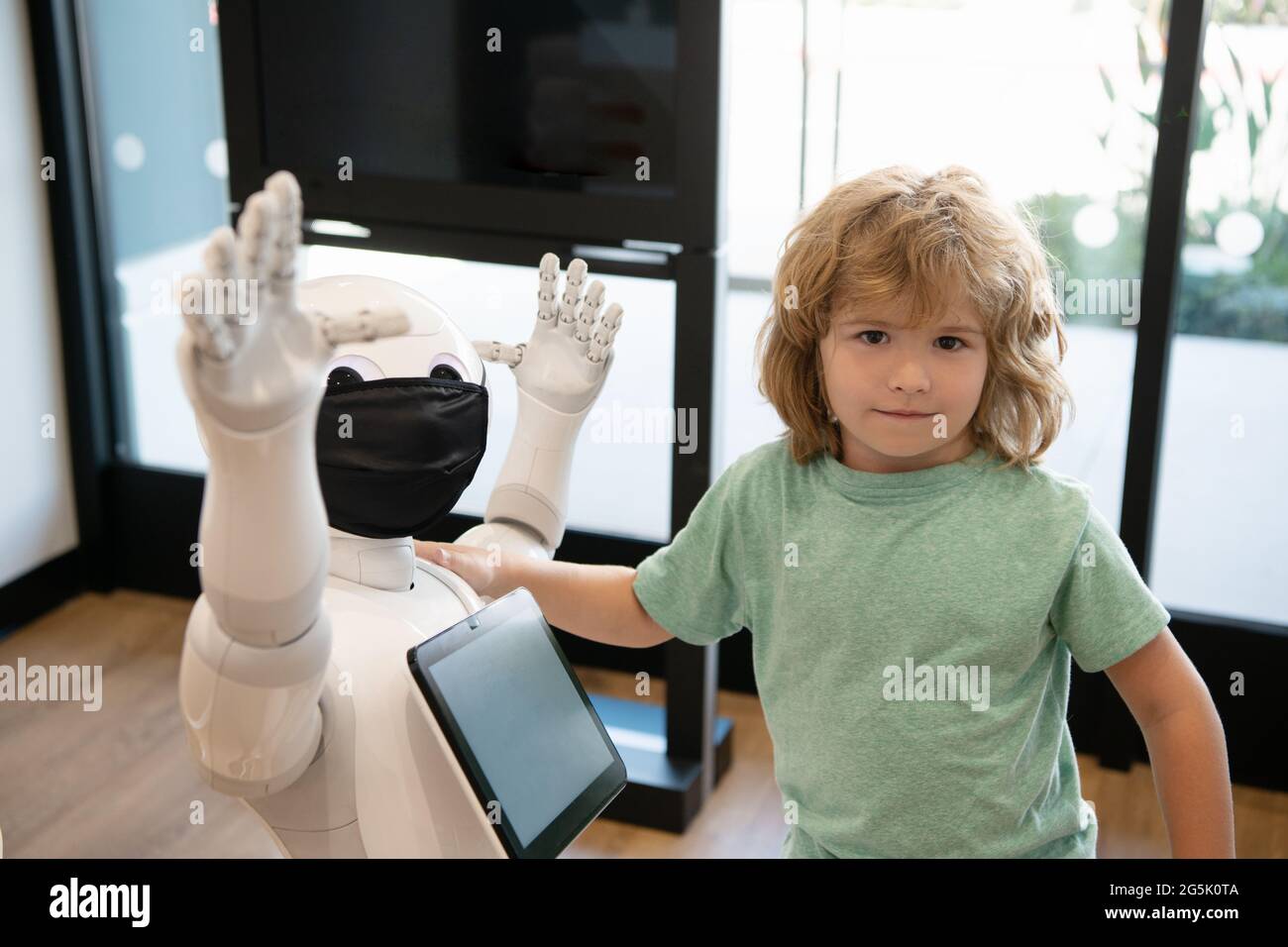 smart boy child communicate with robot assistant technology for modern ...