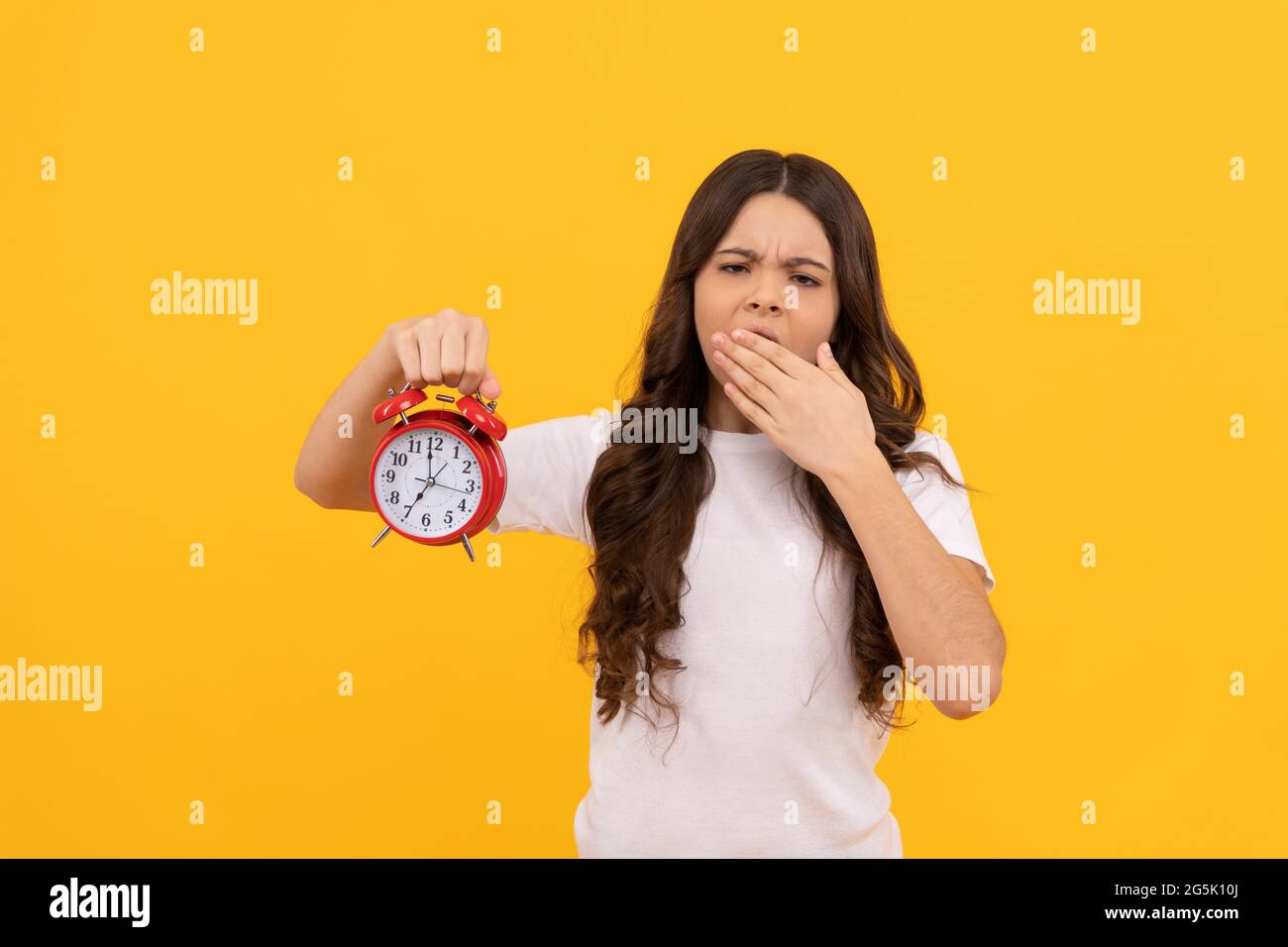 do not be late. punctual kid with clock. deadline. sleepy kid hold ...