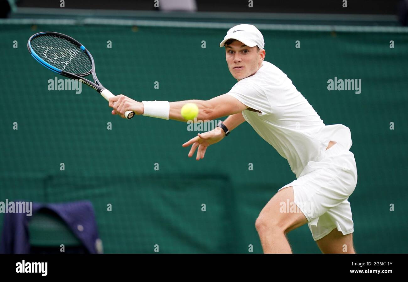 Jack Draper in action against Novak Djokovic on centre court on day one ...