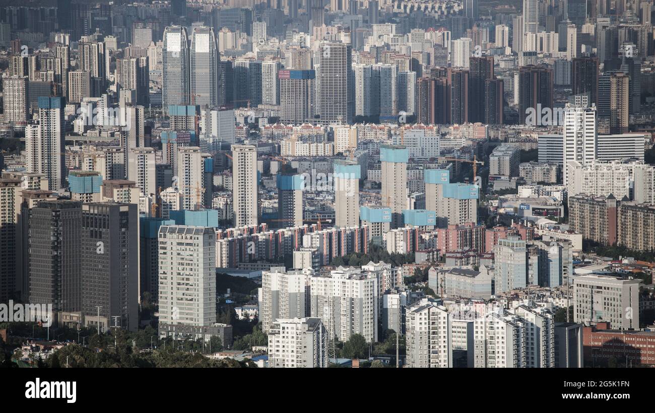 City of Kunming with buildings built tightly, huge population in China ...