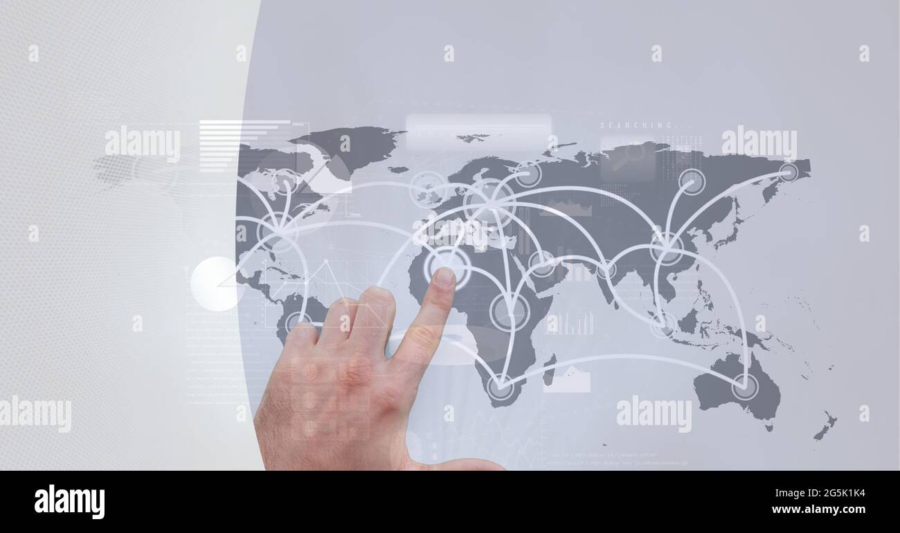 Composition of finger touching interactive world map Stock Photo - Alamy