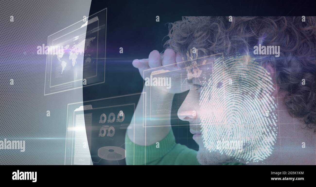 Composition of fingerprint and businessman with interactive screen with ...