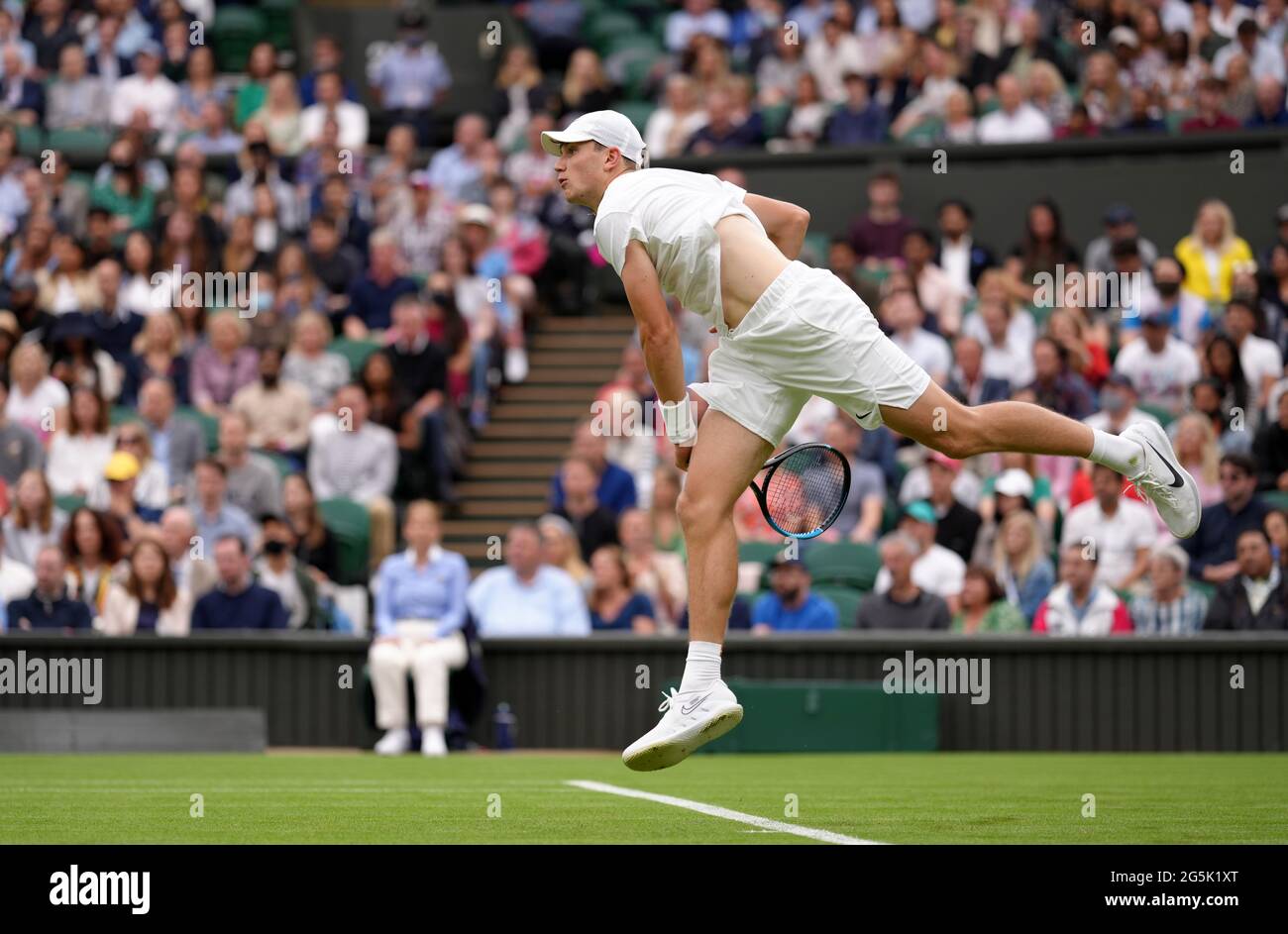 Jack Draper in action against Novak Djokovic on centre court on day one ...