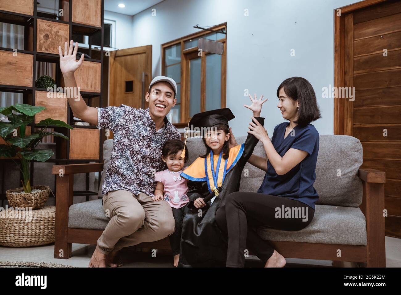 Happy smiling asian family at graduation ceremony hi-res stock ...