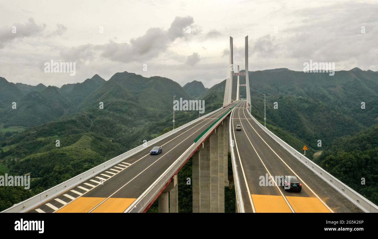 Duyun. 28th June, 2021. Aerial photo taken on June 28, 2021 shows cars ...
