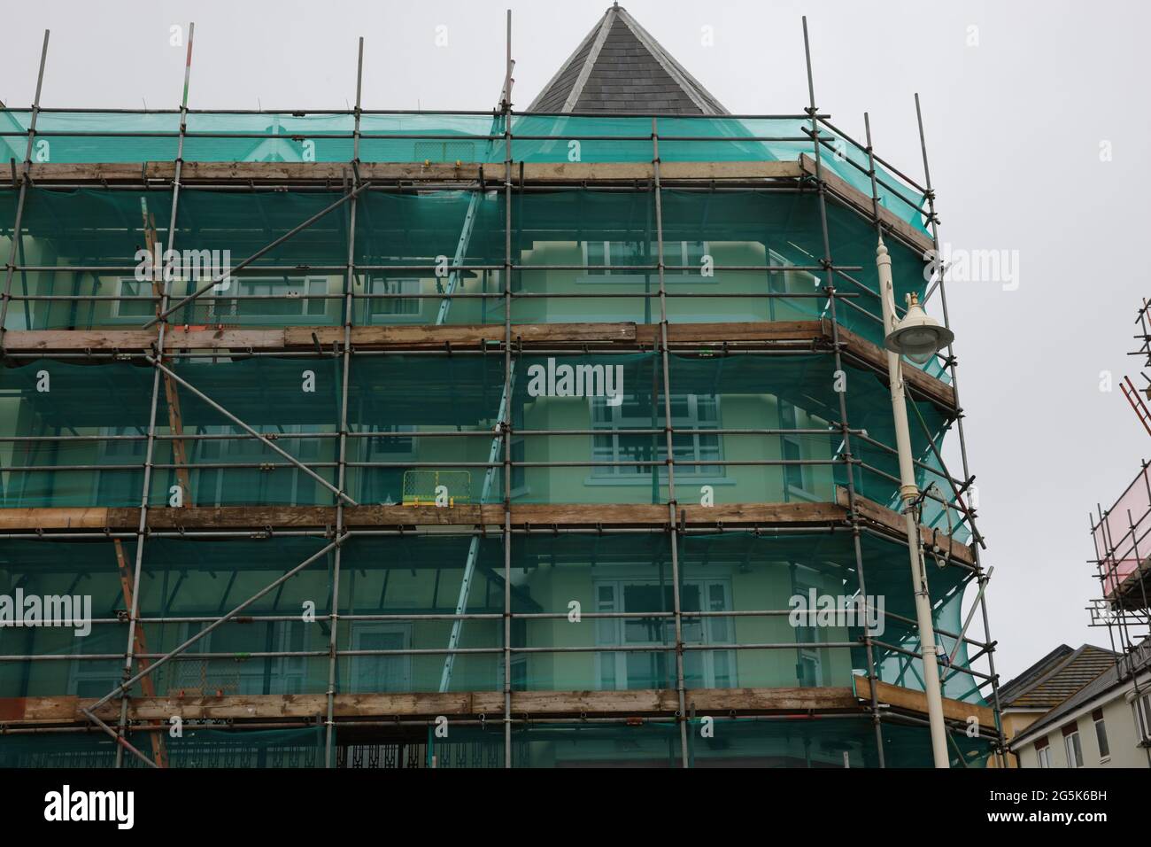 Scaffolding seen against a building in the UK Stock Photo - Alamy