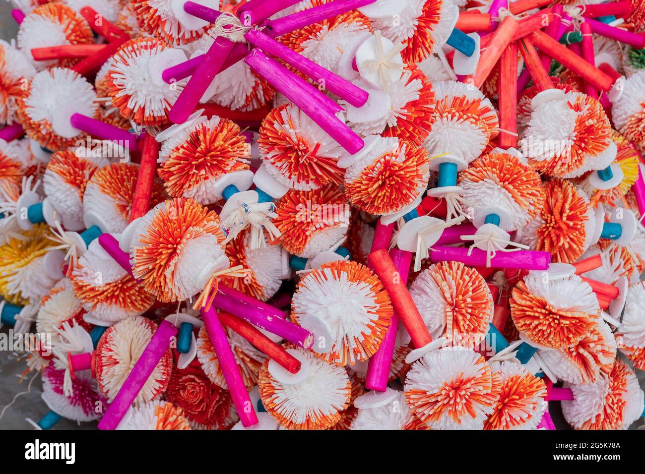 Red and white painted decorated balls made from thermocol, worship ...
