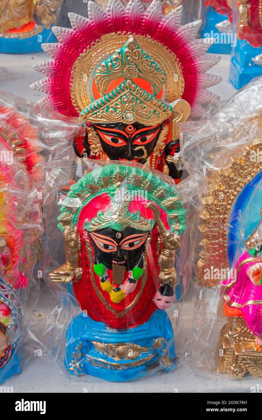 Colourful clay idol of Goddess Kali. On display for sale at Kalighat ...