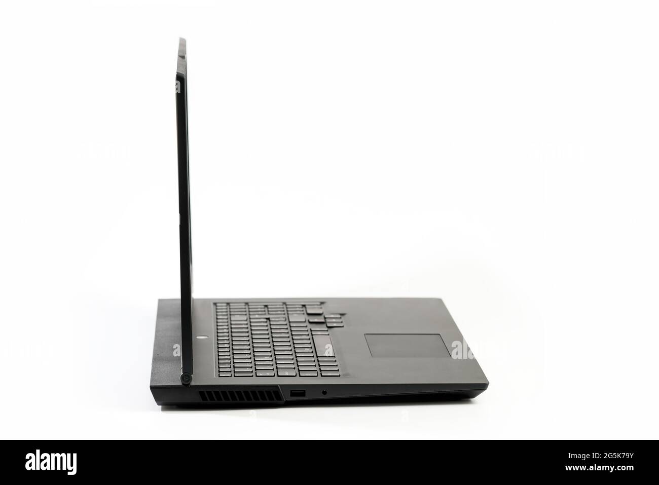 Large open Laptop isolated on white background - Side view with ...